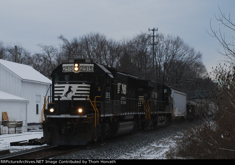NS M9G heads west on the LEHL approaching MP 68.8